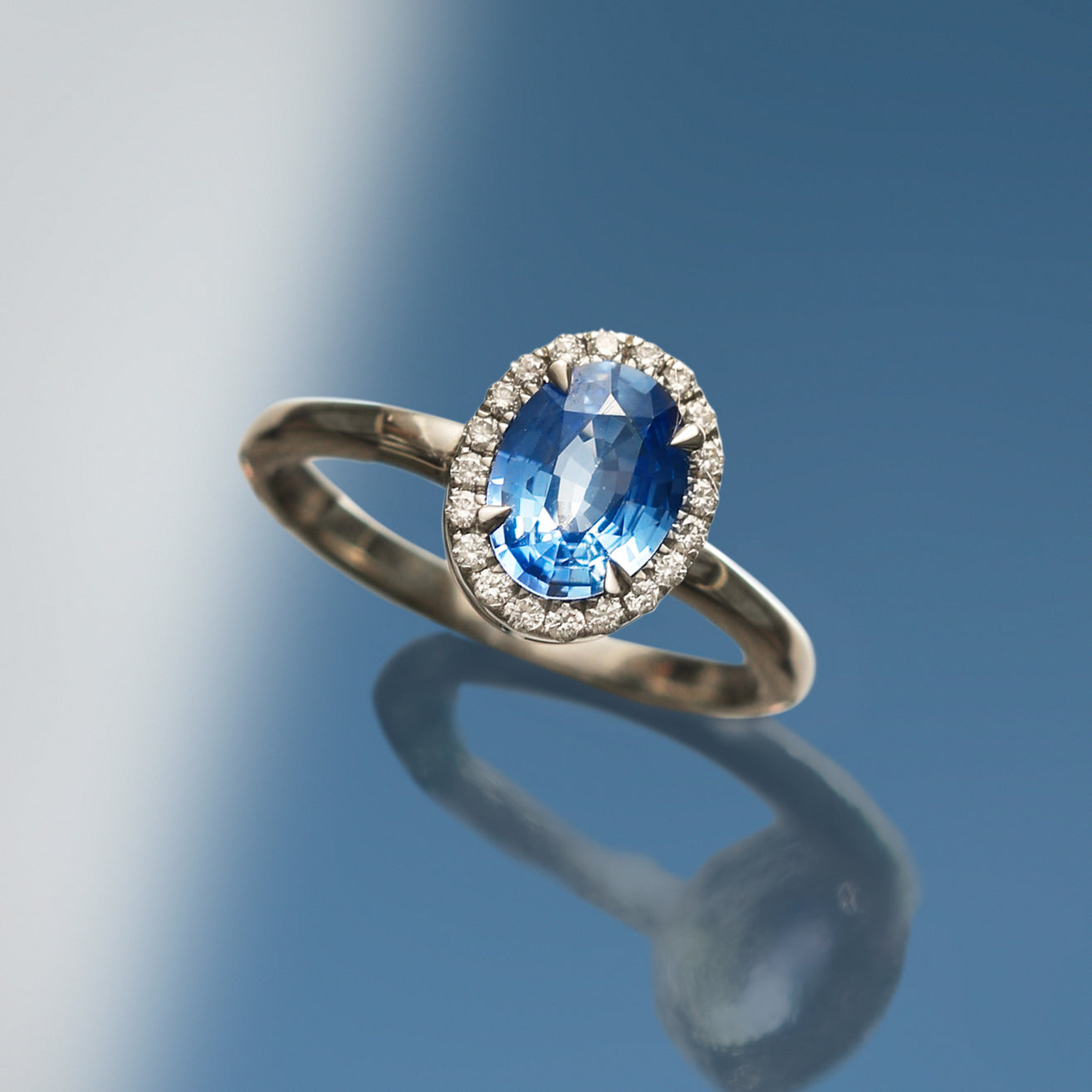 Fenton - Halo Round Blue Sapphire 18kt Rose Gold Ring